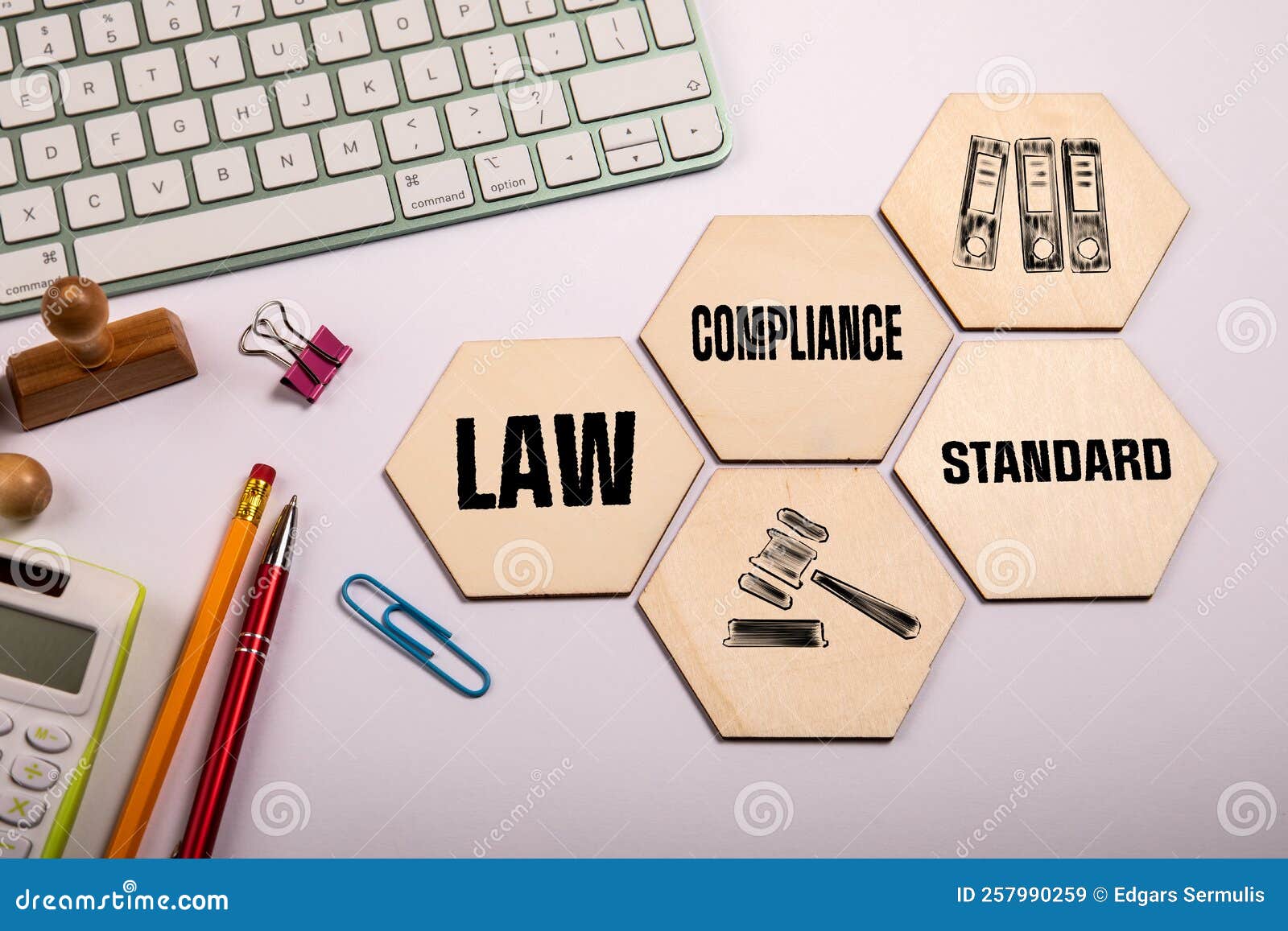 REGULATION CONCEPT. Computer Keyboard and Stationery on a White Office ...