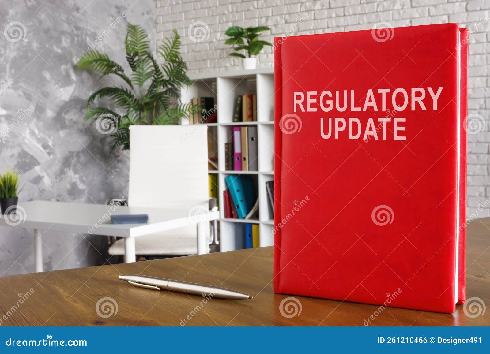 Regulatory Update Book on the Wooden Surface. Stock Photo - Image of ...