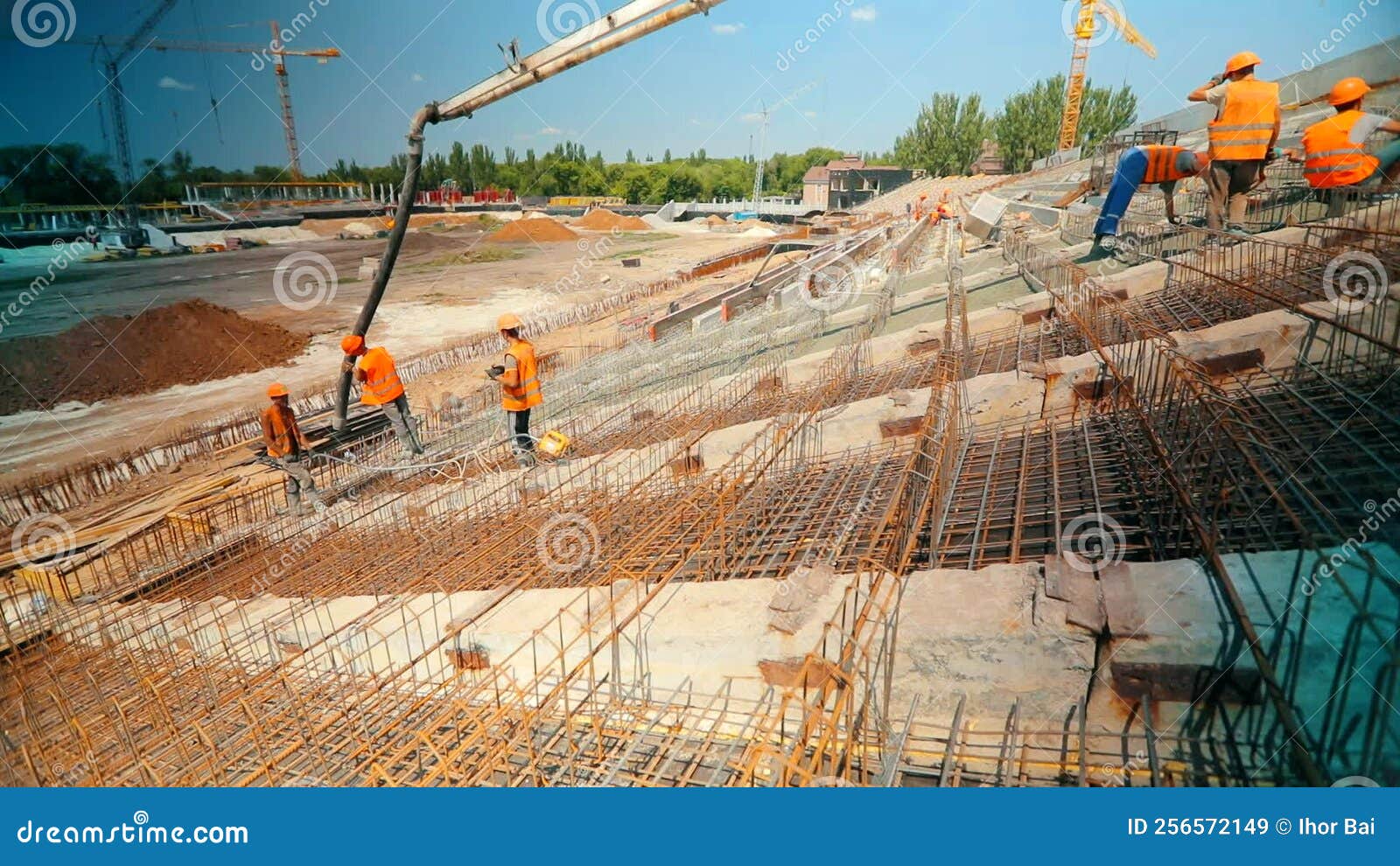 Working Process at a Construction Site. Workers Make a Reinforced ...