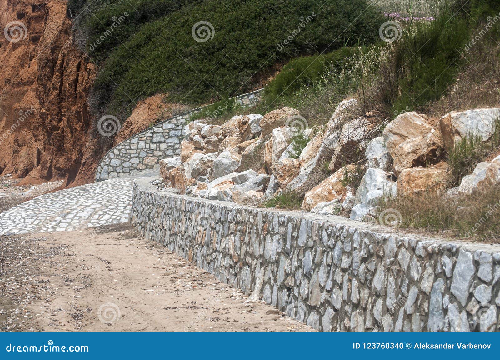 Reinforcing Masonry Stone Wall on a Beach Stock Photo - Image of eroded ...