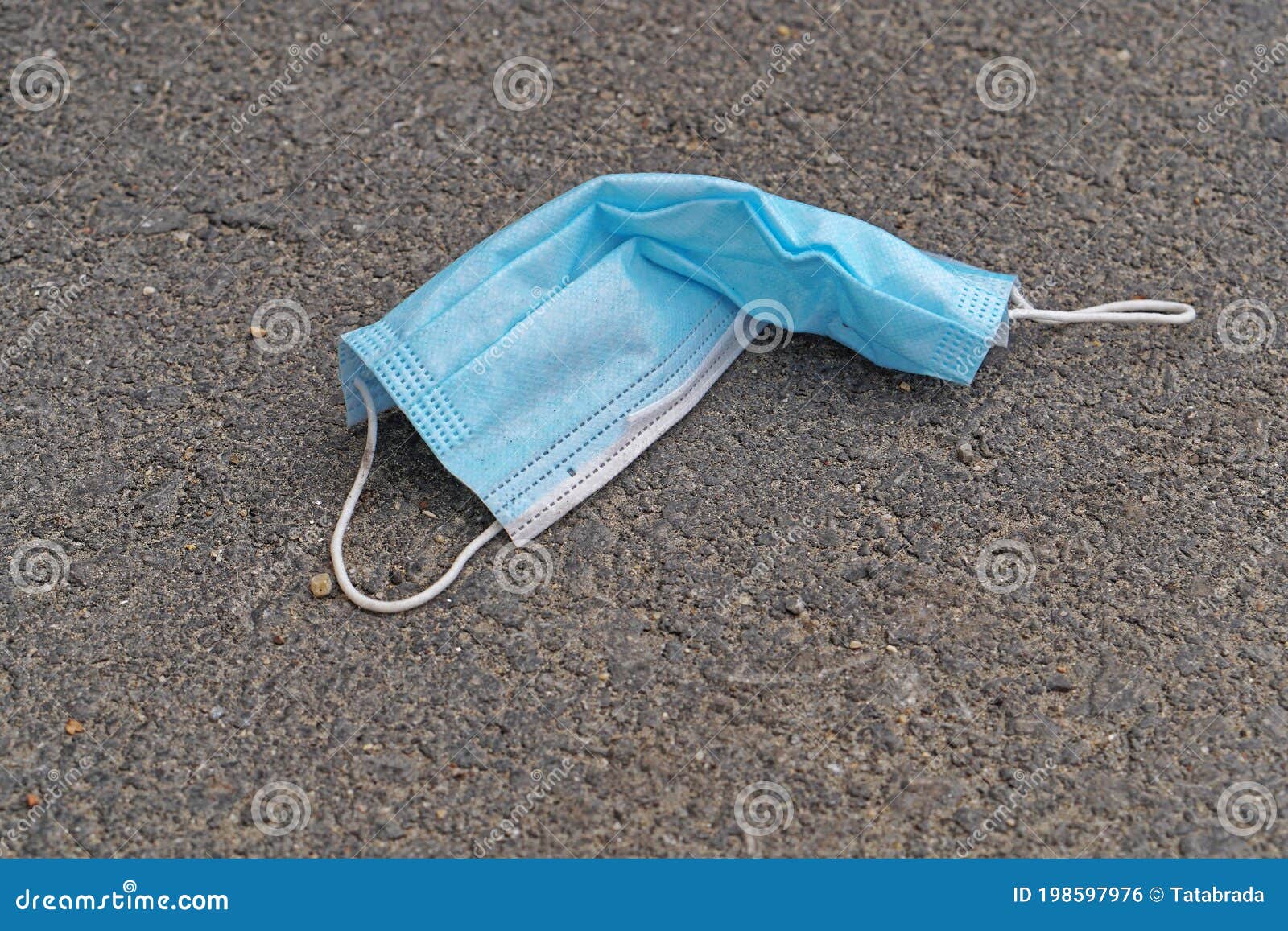 Discarded mask stock photo. Image of concrete, pavement - 198597976