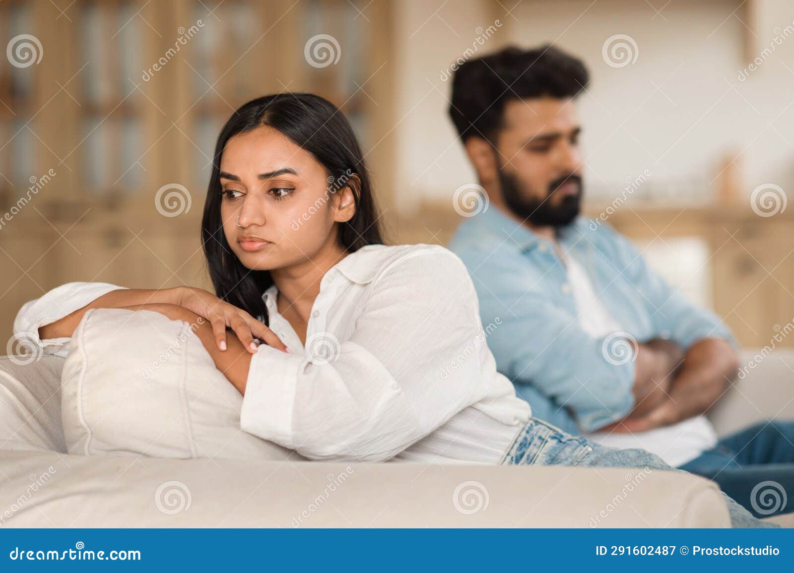 Relationship Crisis Offended Indian Spouses Sitting On Sofa After