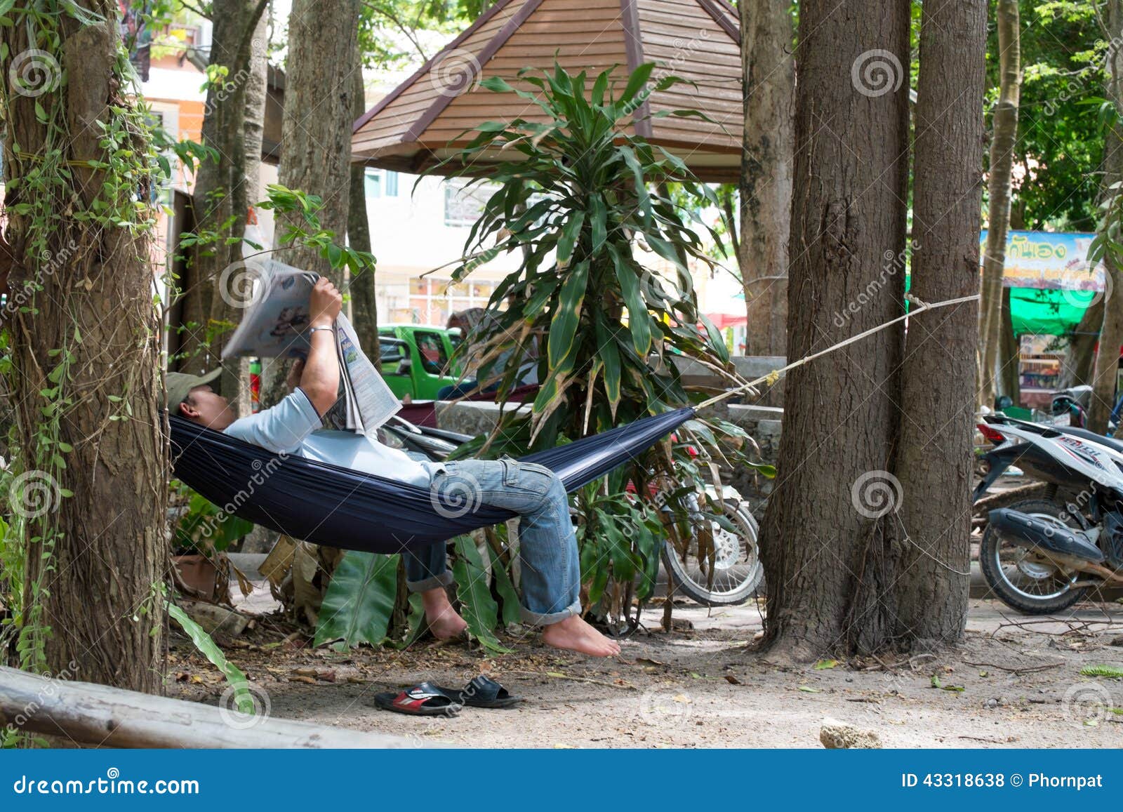 Relax Man in the Cot while Reading Newspaper Editorial Stock Photo ...