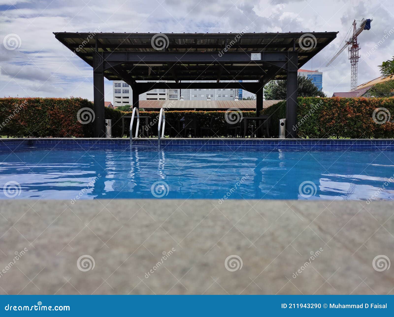 Relax by the pool stock photo. Image of leisure, reflection - 211943290