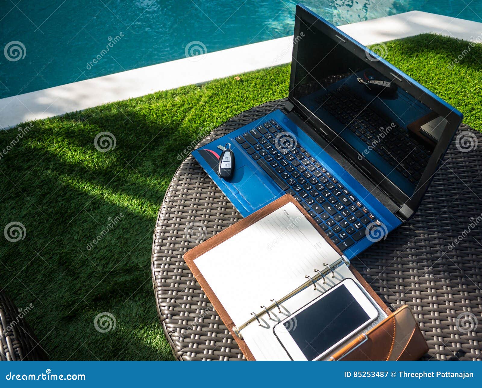 Relax Time Working Area Near Pool with Laptop, Notebook and Phone Stock ...