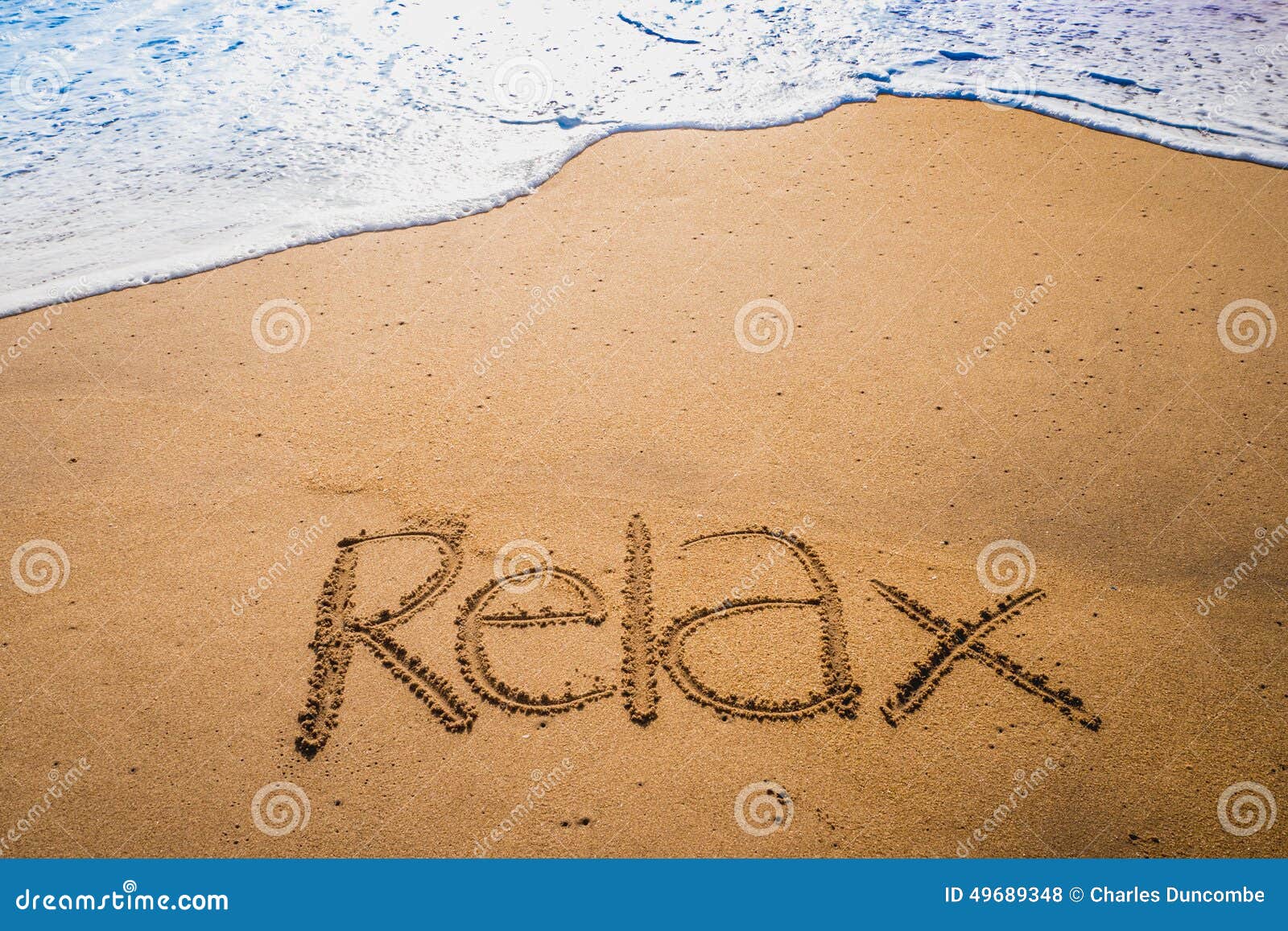 Relax Written into the Sand on a Beach Stock Photo - Image of relaxing ...