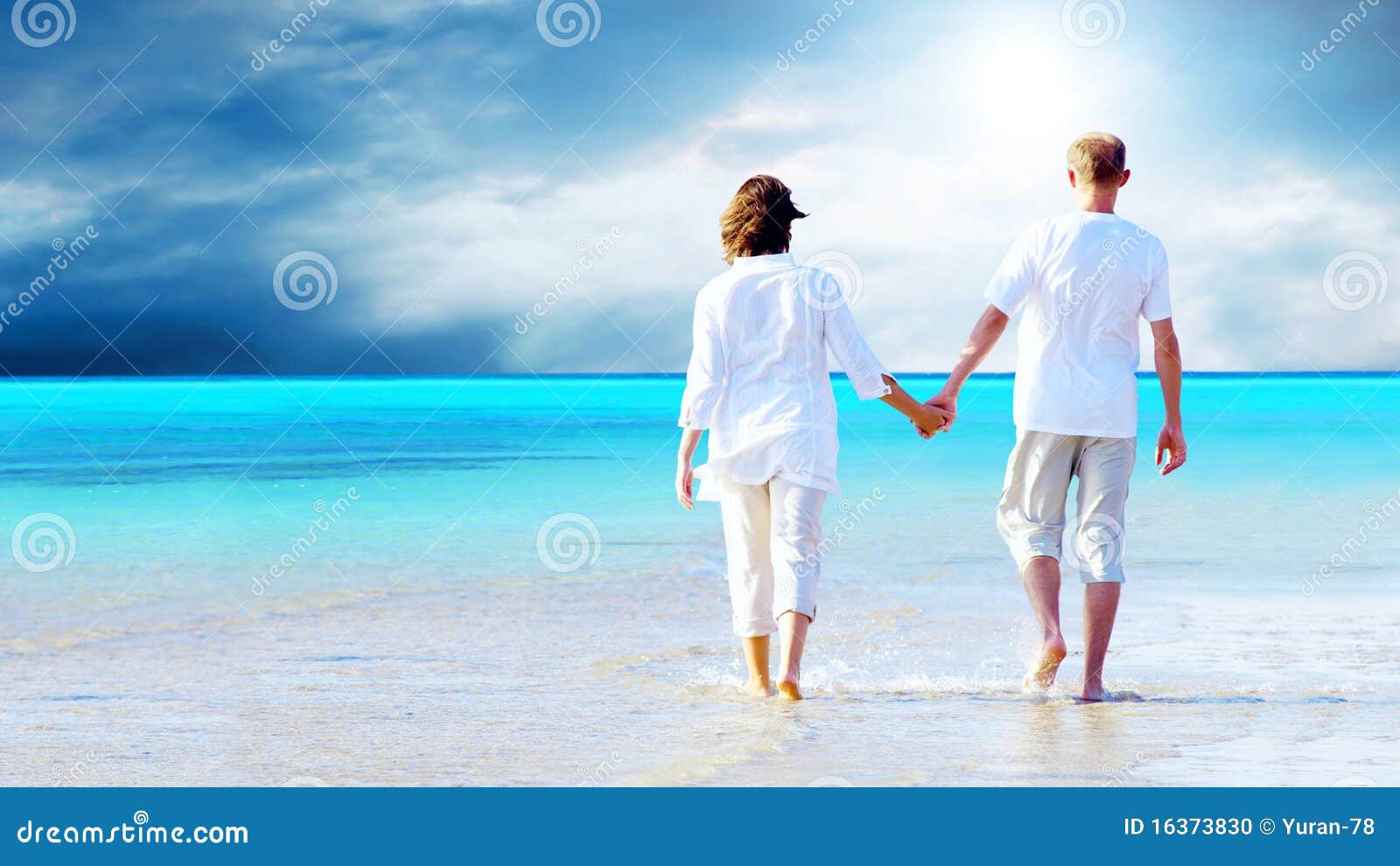 Relaxation on the beach stock photo. Image of couple - 16373830