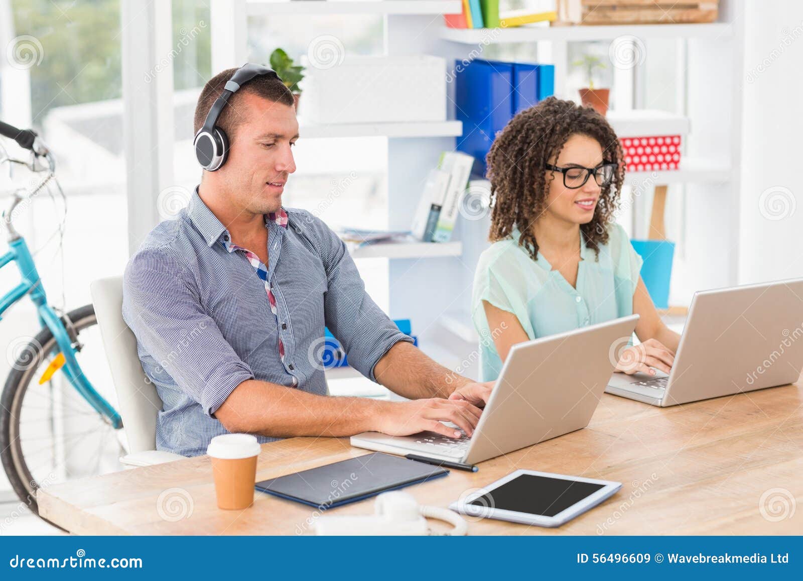 Relaxed Business Colleagues Working on Laptop Stock Image - Image of ...