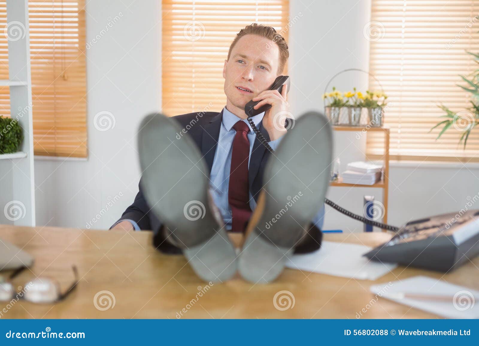 Relaxed Businessman Making a Phone Call Stock Photo - Image of calling ...