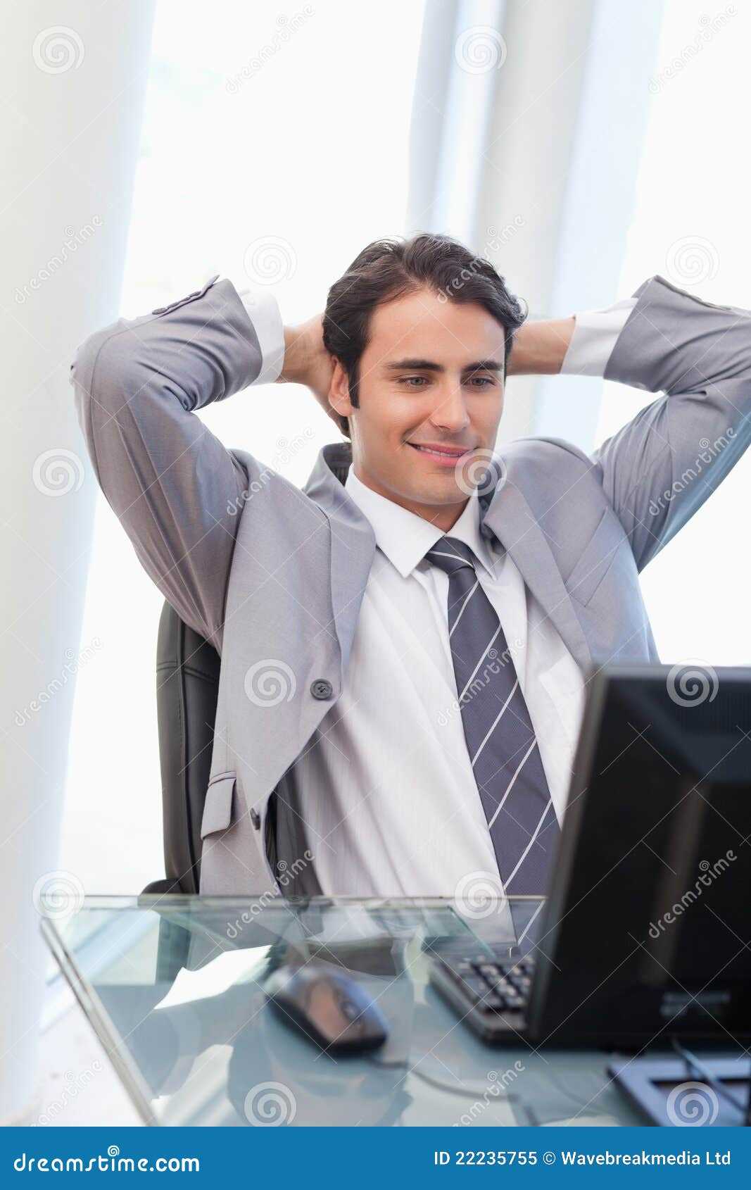A Relaxed Businessman Working with a Computer Stock Image - Image of ...