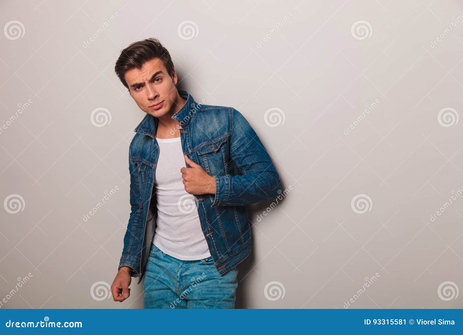Relaxed Casual Man Holding His Jacket by the Colla Stock Image - Image ...