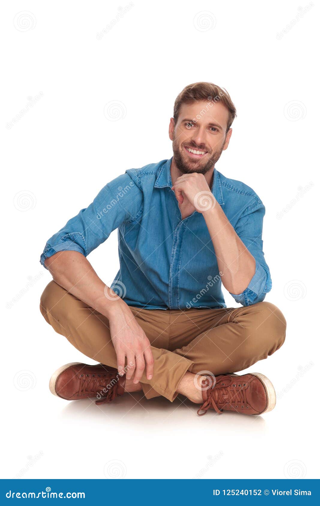 Relaxed Casual Man Is Smiling And Sitting Down Stock Photo - Image of ... Relaxed Casual Man Is Smiling And Sitting Down Stock Photo - Image of ...