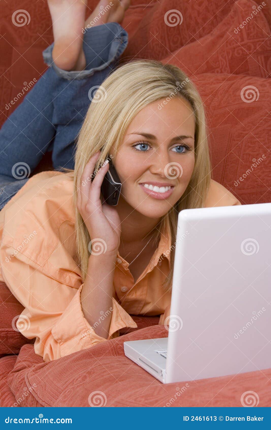 Relaxed Communication stock image. Image of laying, phone - 2461613