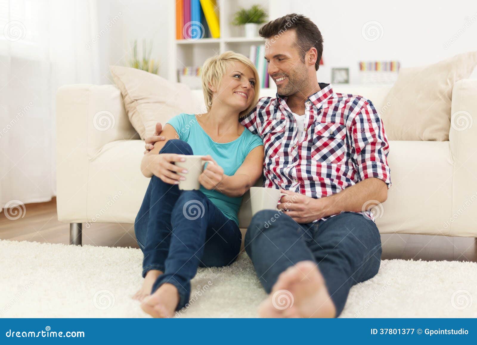 Relaxed couple at home stock image. Image of affectionate - 37801377