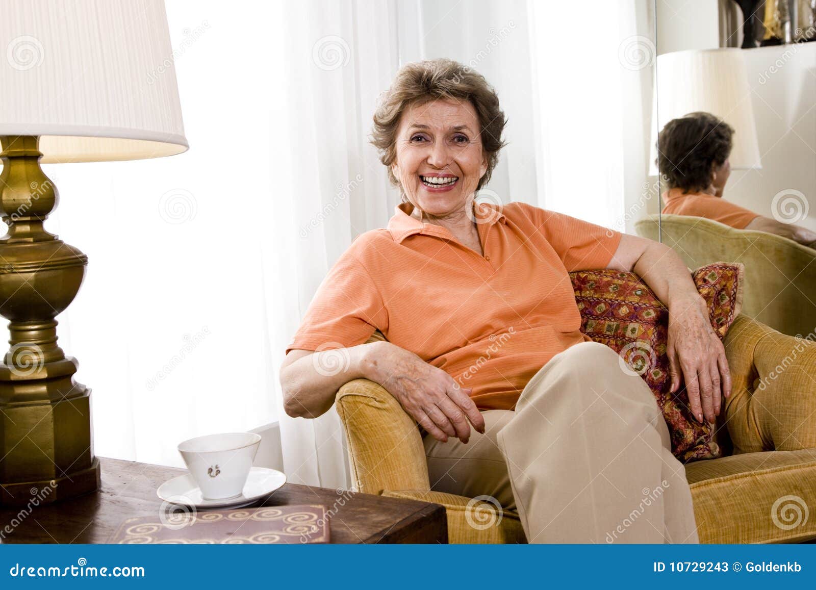 Relaxed elderly woman stock image. Image of hair, armchair - 10729243
