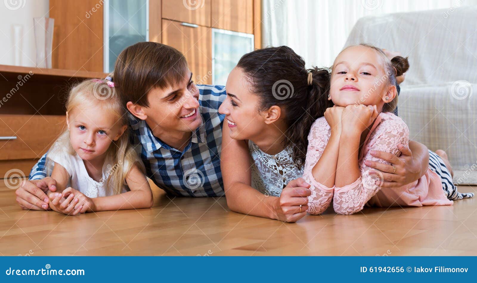 Relaxed Family in Domestic Interior Stock Photo - Image of spouses ...