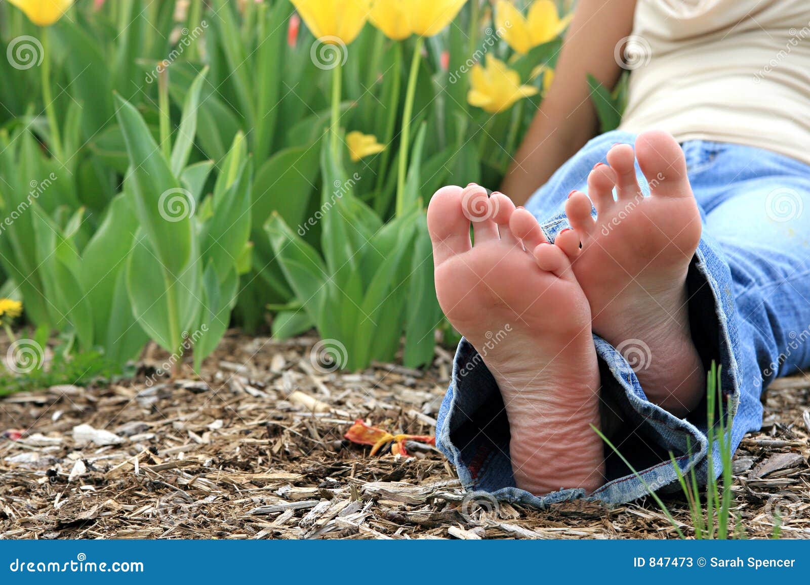 Relaxed feet stock image. Image of ground, jeans, yellow - 847473