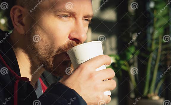 Guy Drinking Coffee in a Cafe Stock Image - Image of smile, lifestyle ...
