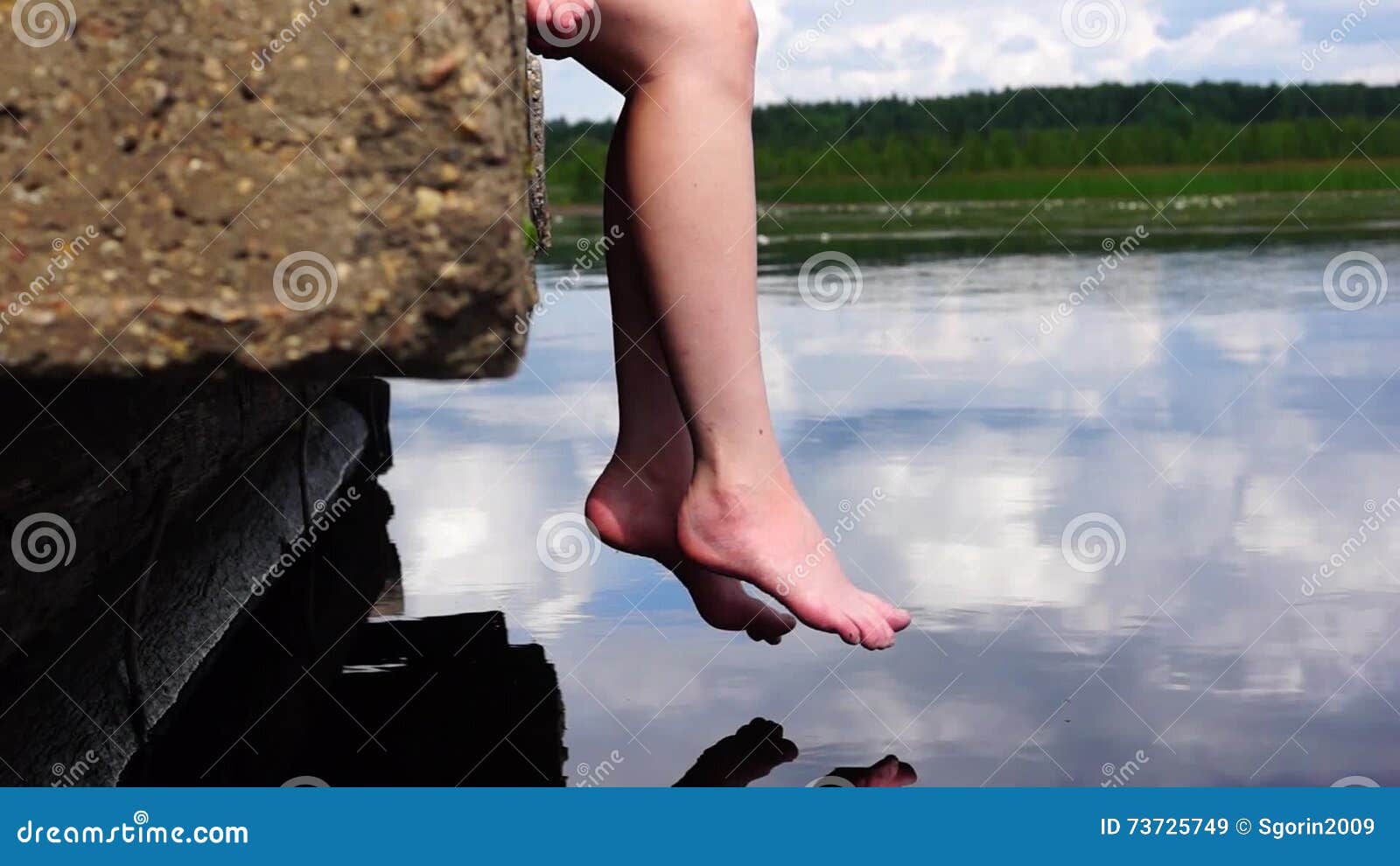 Relaxed Legs Over Lake Water Stock Video - Video of leisure, dangling ...