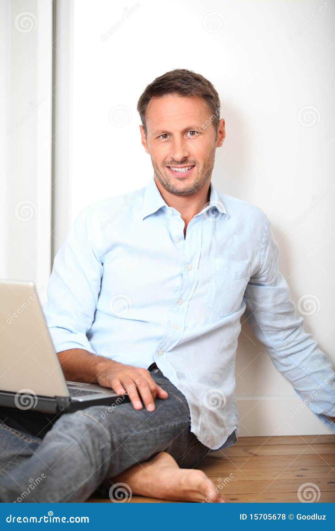 Relaxed man at home stock photo. Image of websurfing - 15705678