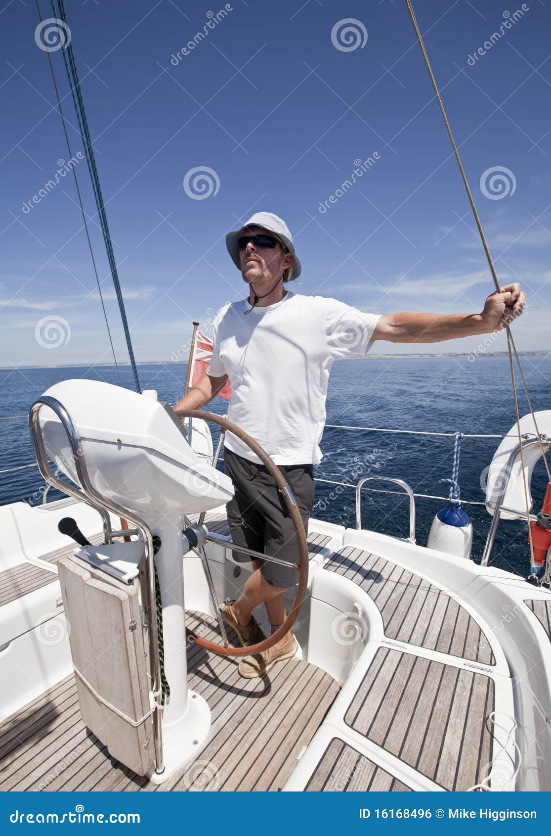 Relaxed man sailing yacht stock photo. Image of boat - 16168496