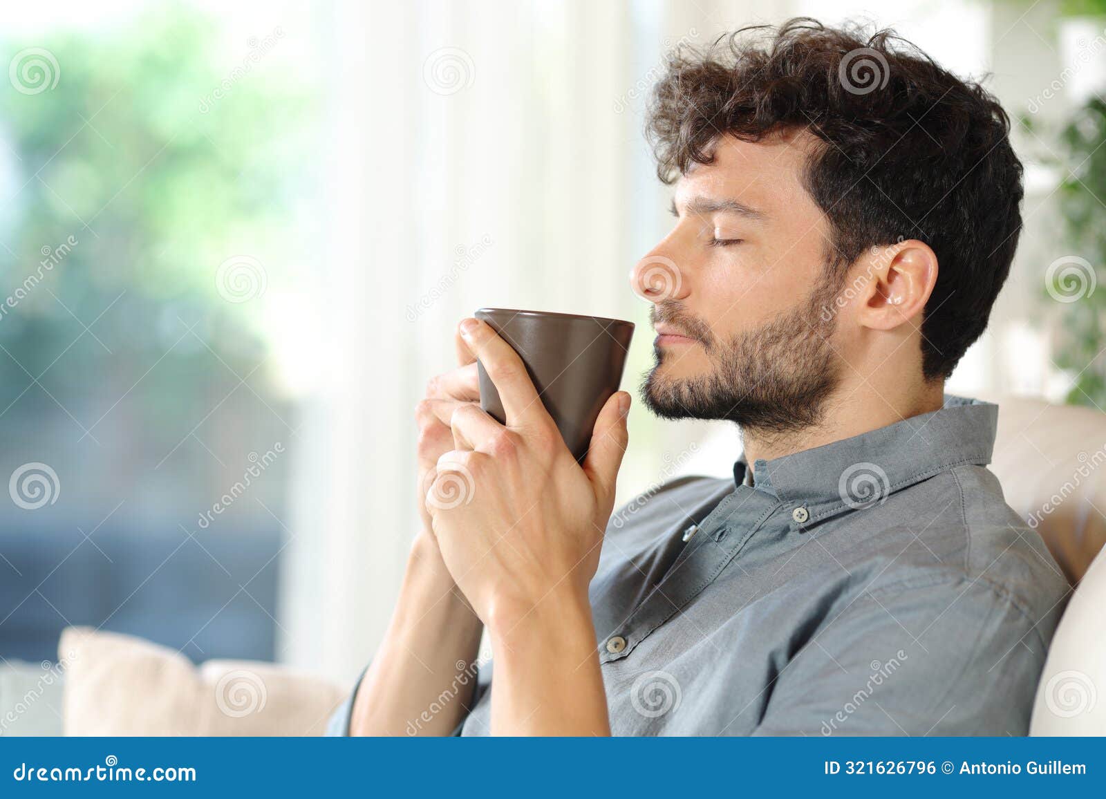 Relaxed Man Smelling Coffee in a House Interior Stock Photo - Image of ...