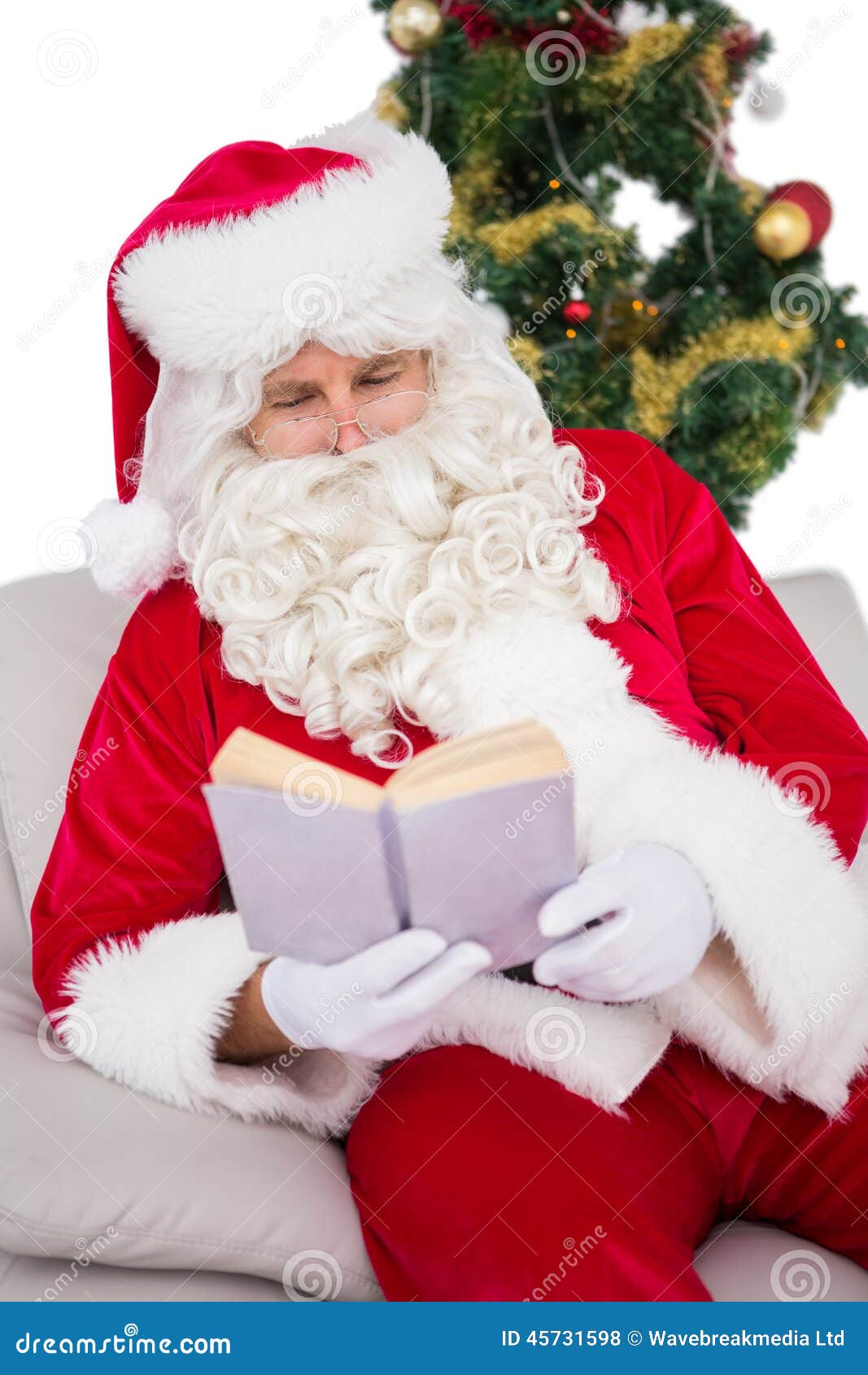 Relaxed Santa Reading on the Couch Stock Photo - Image of person ...