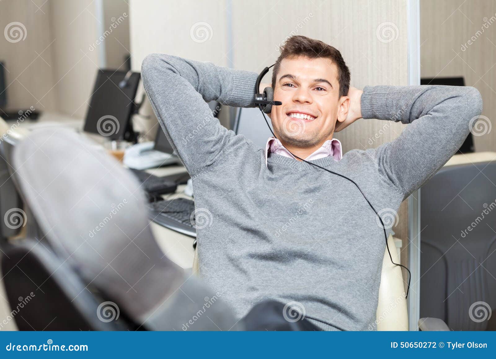 Relaxed Smiling Customer Service Representative Stock Photo - Image of ...