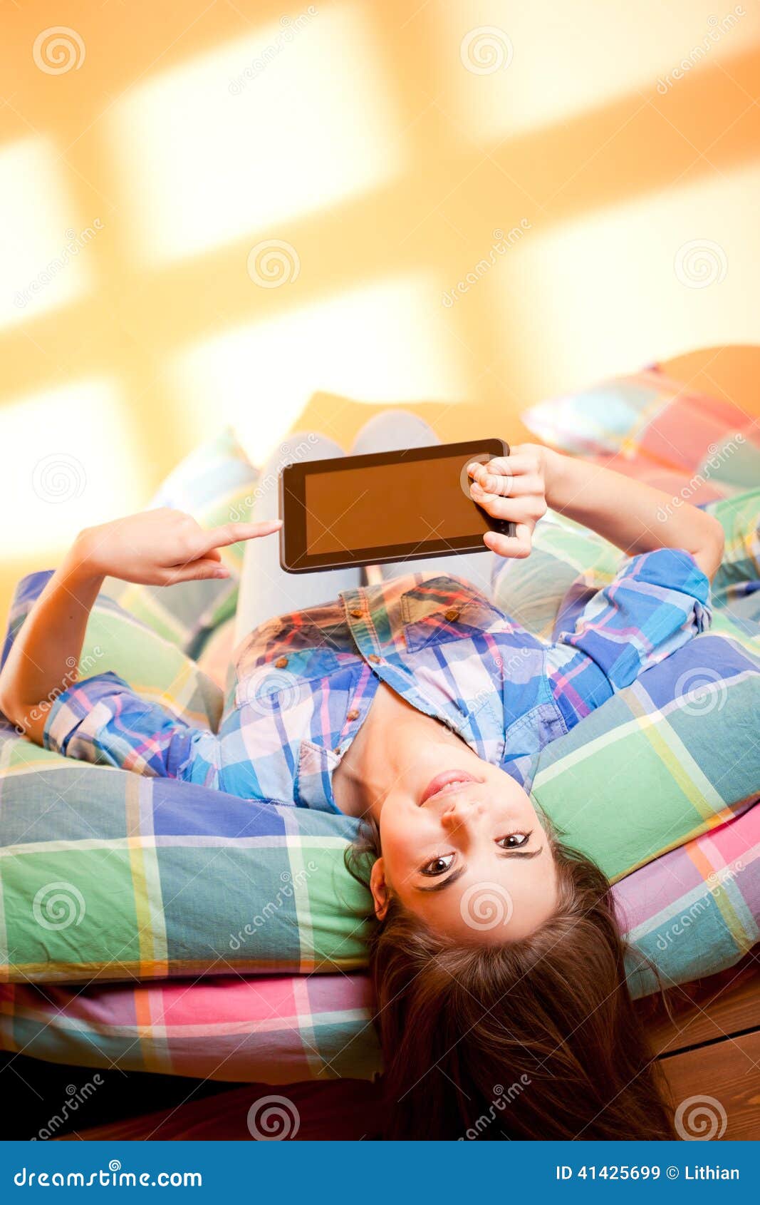 Relaxed tablet fun. stock image. Image of computer, blankets - 41425699