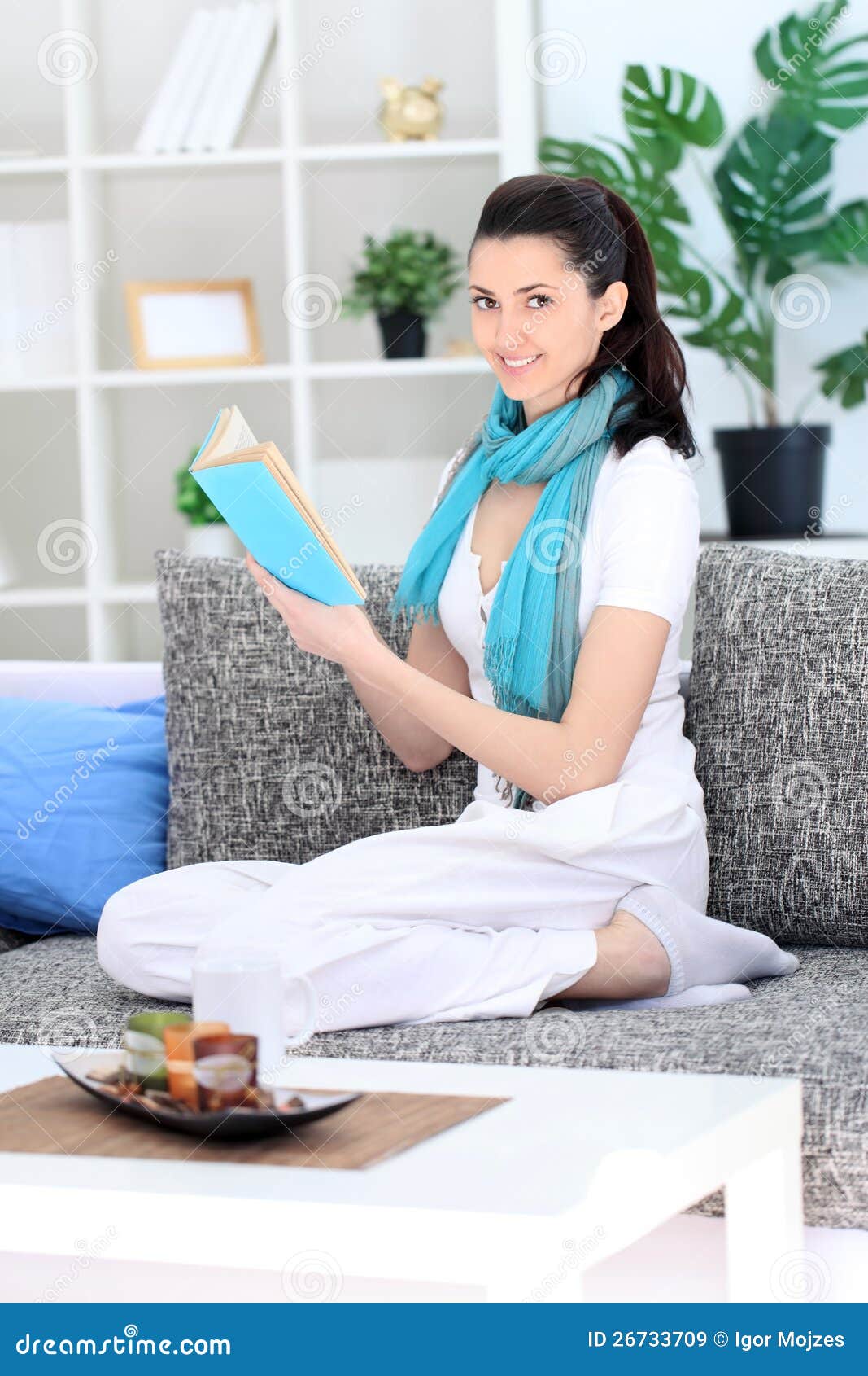 Relaxed woman reading stock image. Image of concentration - 26733709