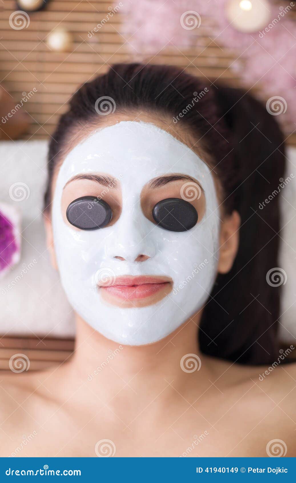 Relaxed Woman Receiving Stone Therapy in Spa Stock Image - Image of ...