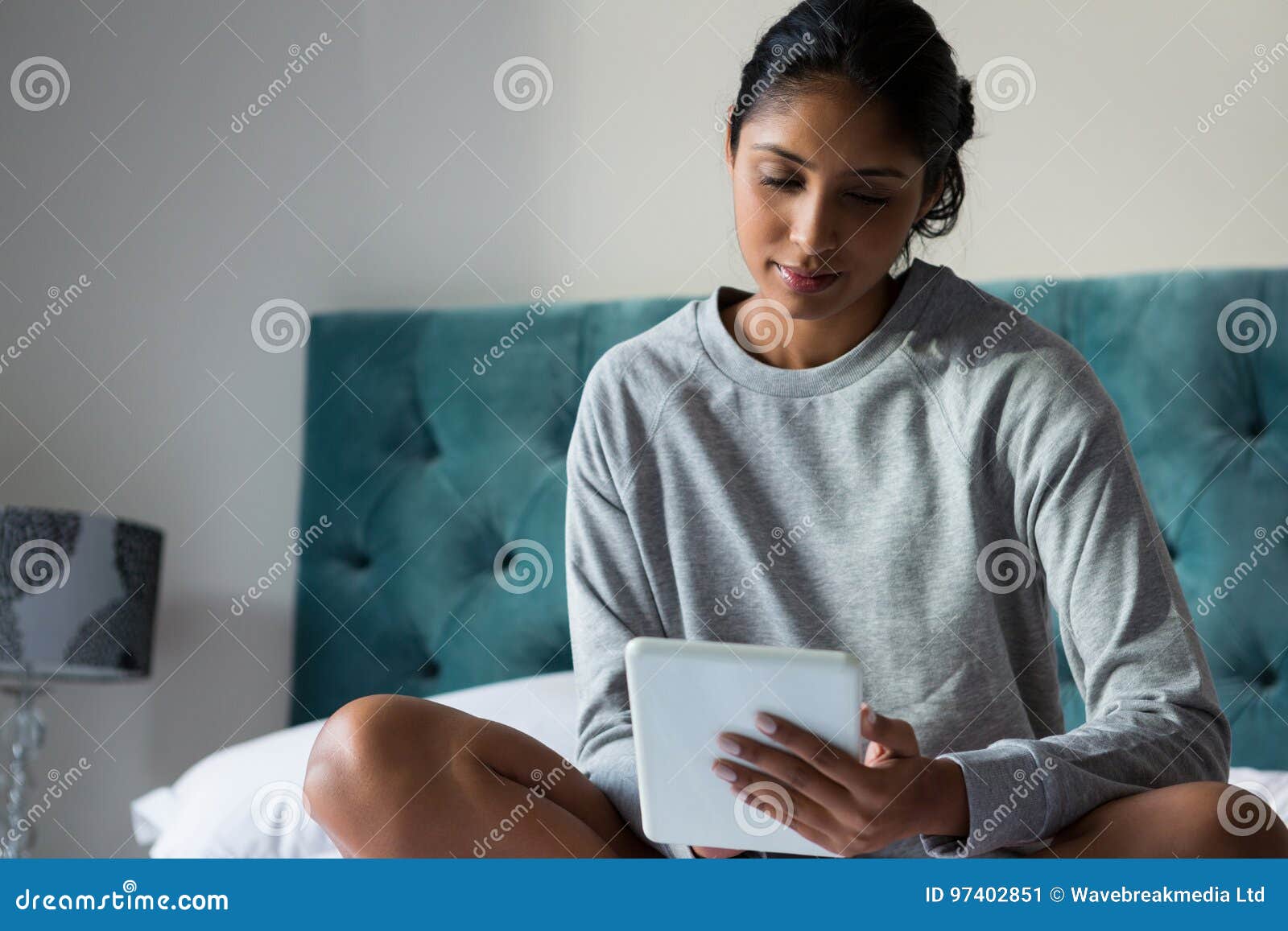 Relaxed Woman Using Digital Tablet on Bed Stock Image - Image of casual ...