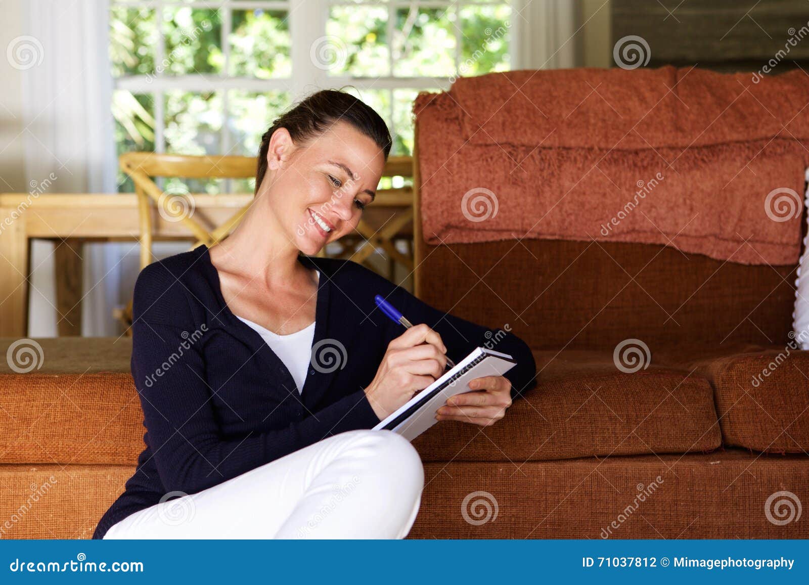 Relaxed Woman Writing in Notebook at Home Stock Photo - Image of beauty ...