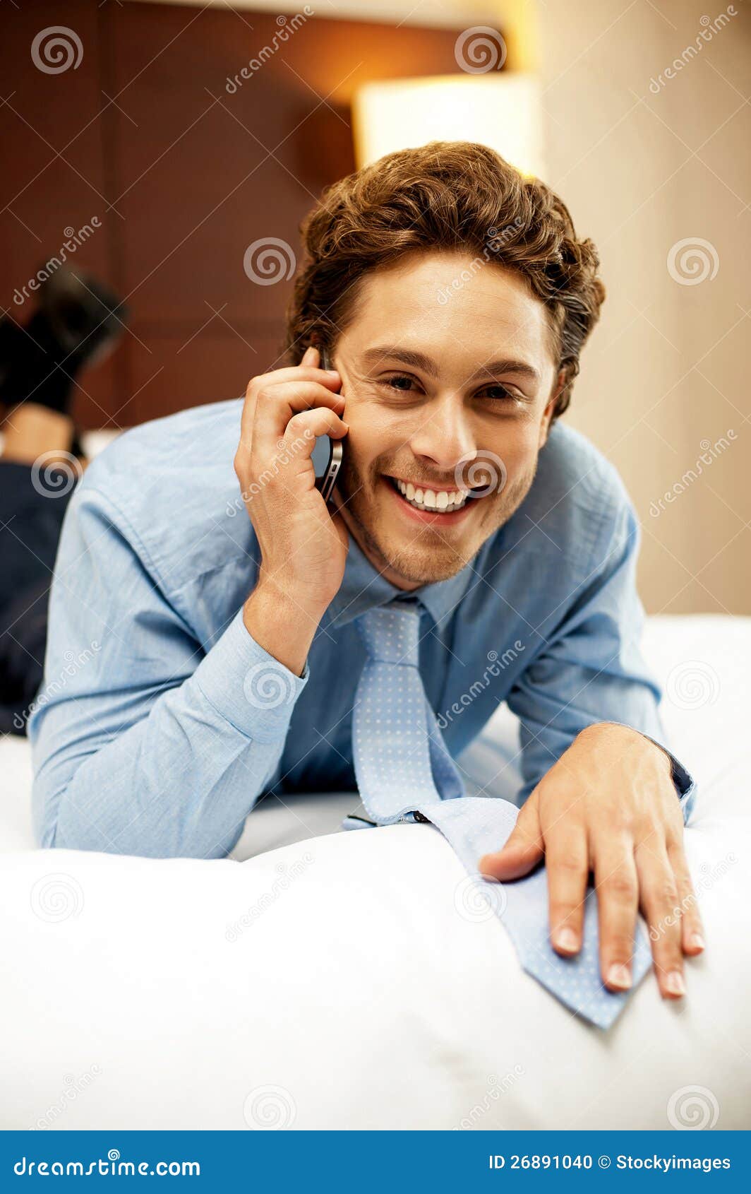 Relaxed Young Businessman Communicating Stock Photo - Image of ...