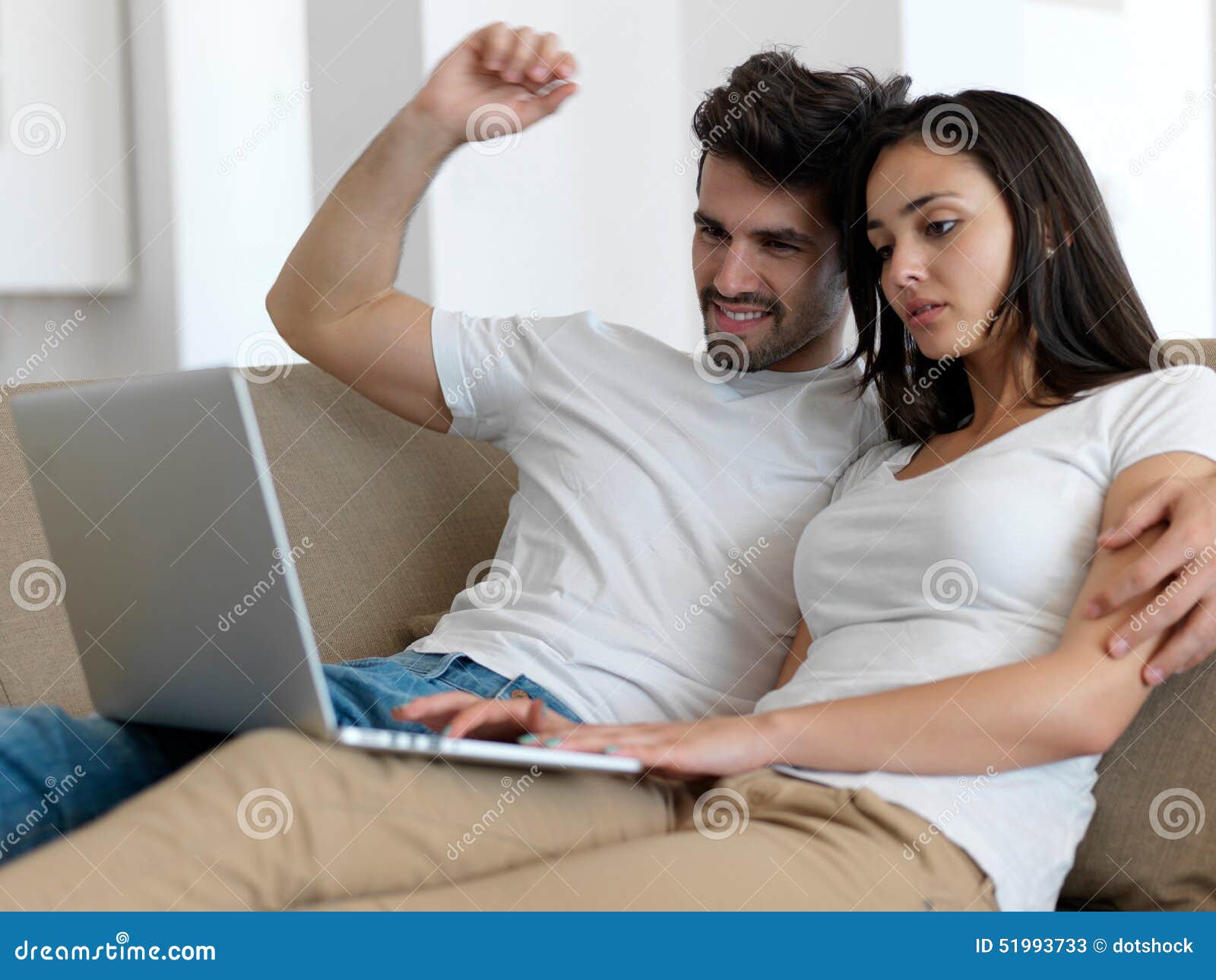 Relaxed Young Couple Working on Laptop Computer at Home Stock Image ...