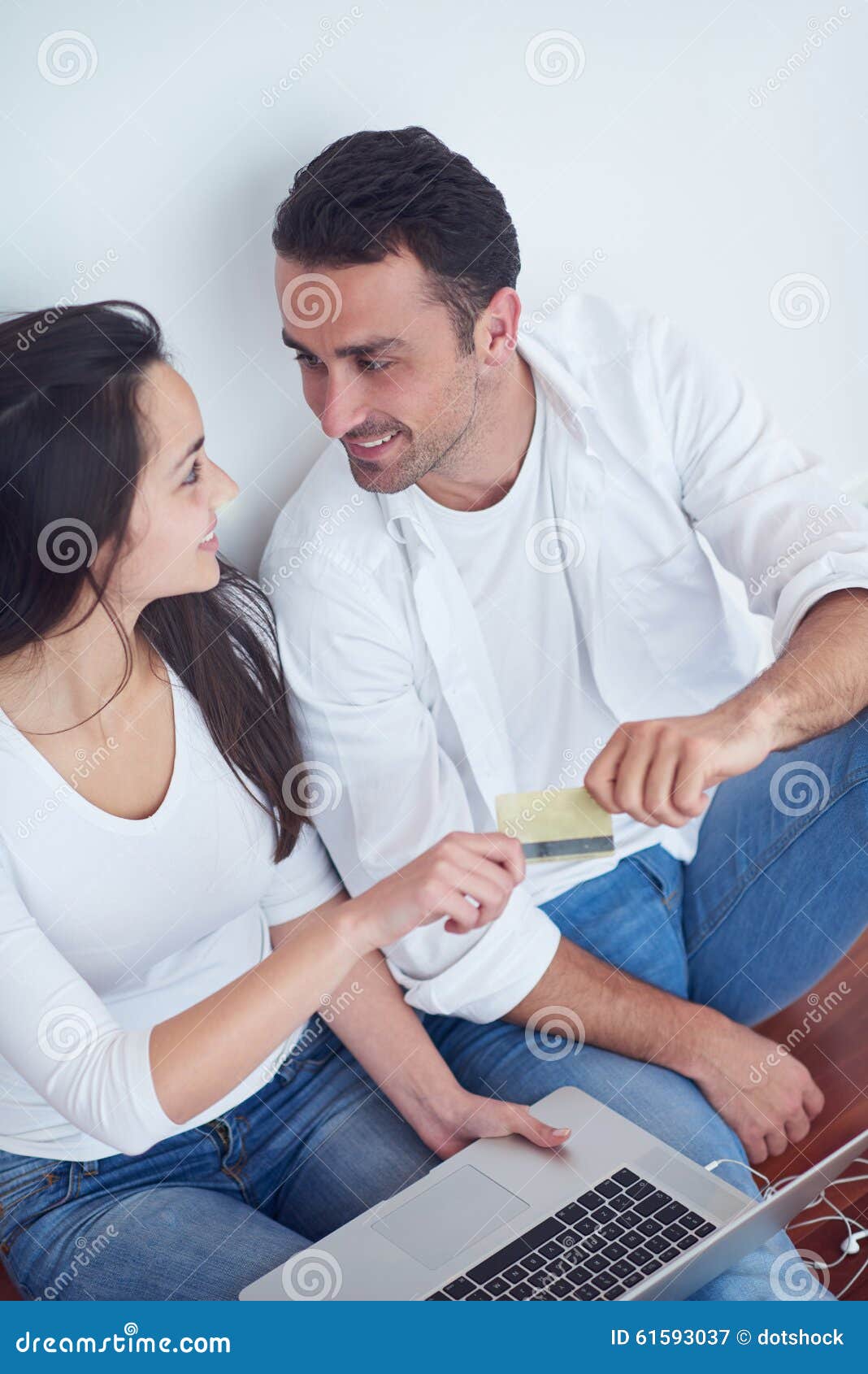 Relaxed Young Couple Working on Laptop Computer at Home Stock Image ...