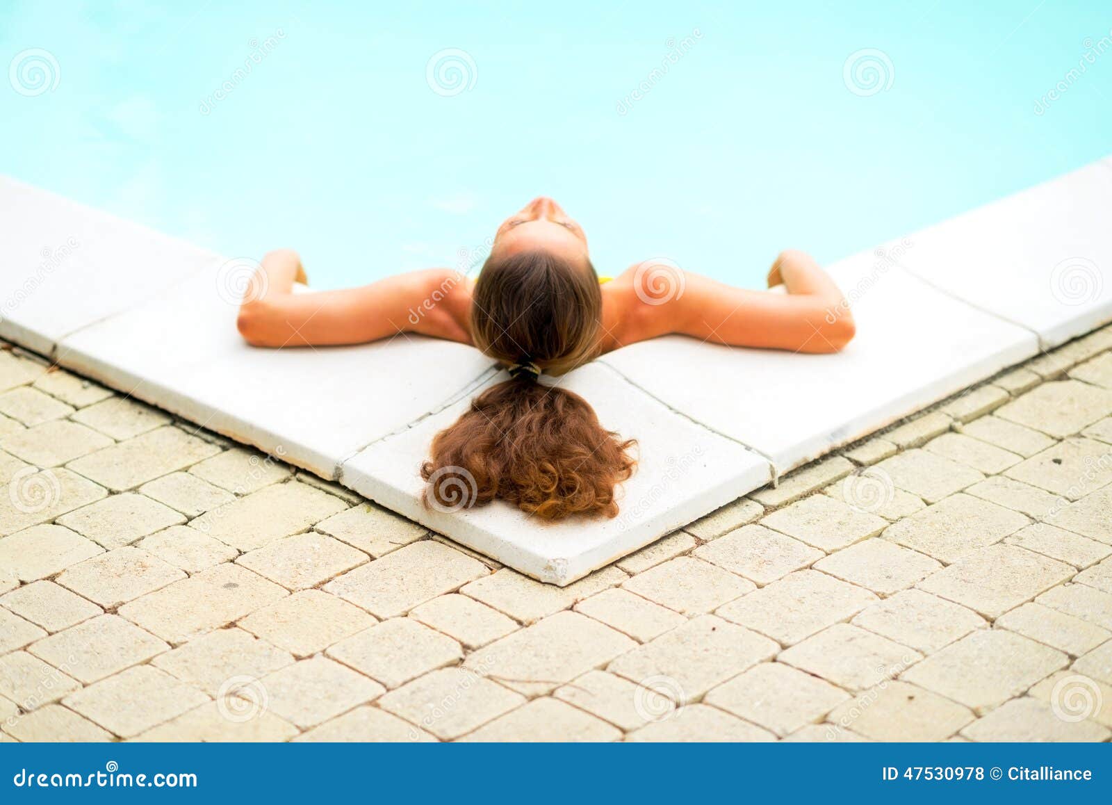 Relaxed Young Woman Laying in Pool Stock Photo - Image of modern ...