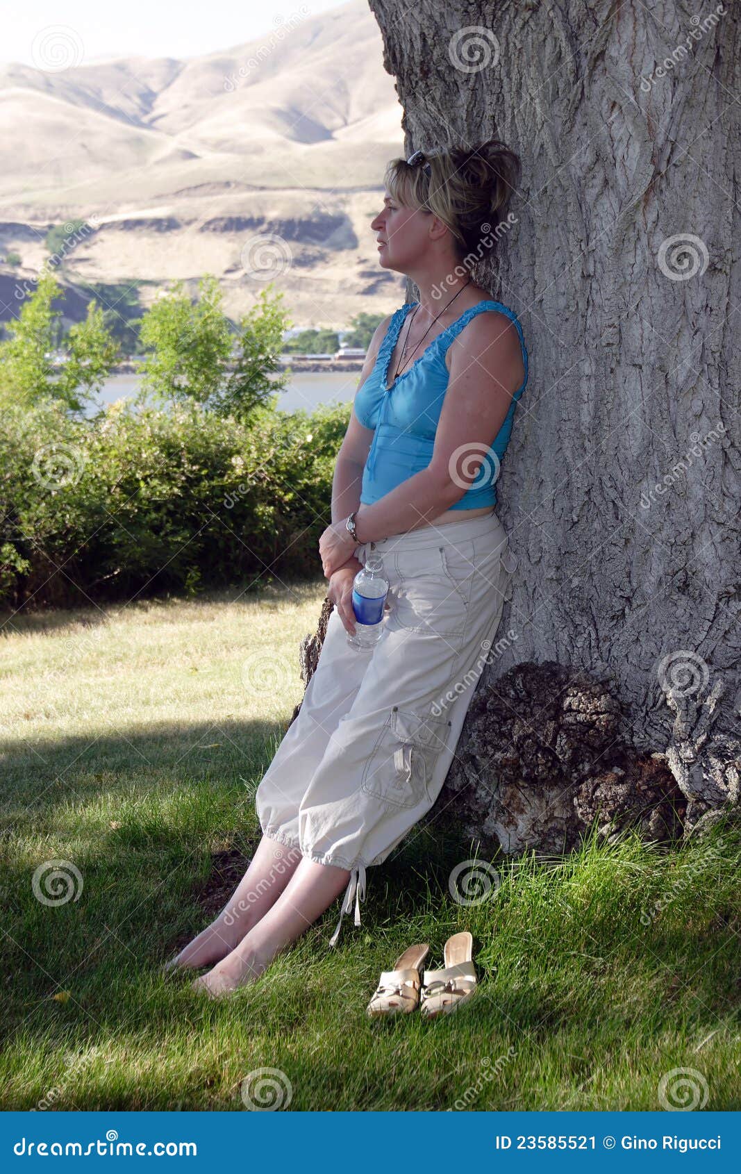 Relaxing Against a Tree Trunk. Stock Image - Image of countryside ...
