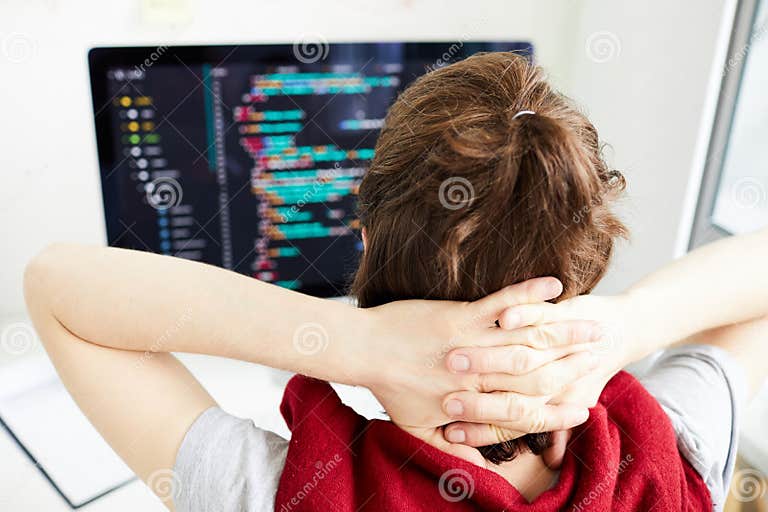 Relaxing while Analyzing Code on Computer Stock Photo - Image of system ...