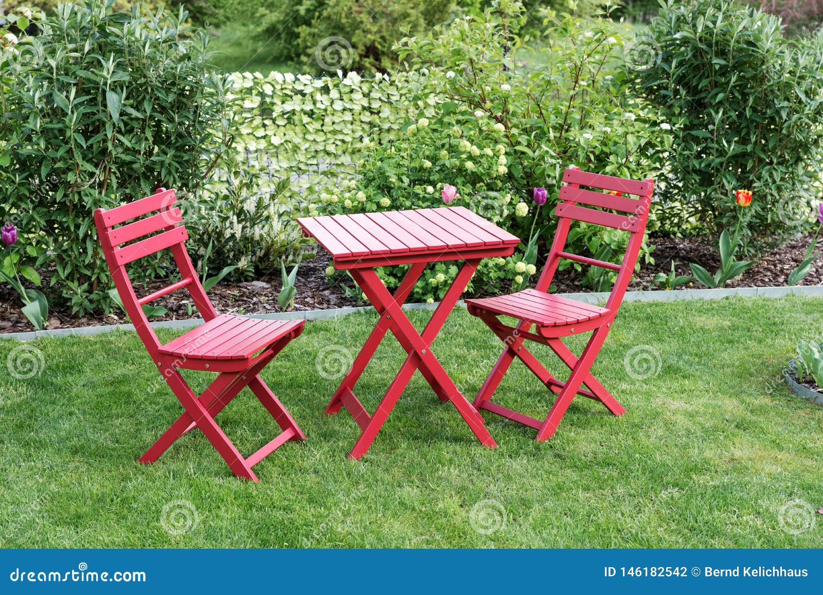 Relaxing Area with Two Red Chairs and Red Table Stock Photo - Image of ...