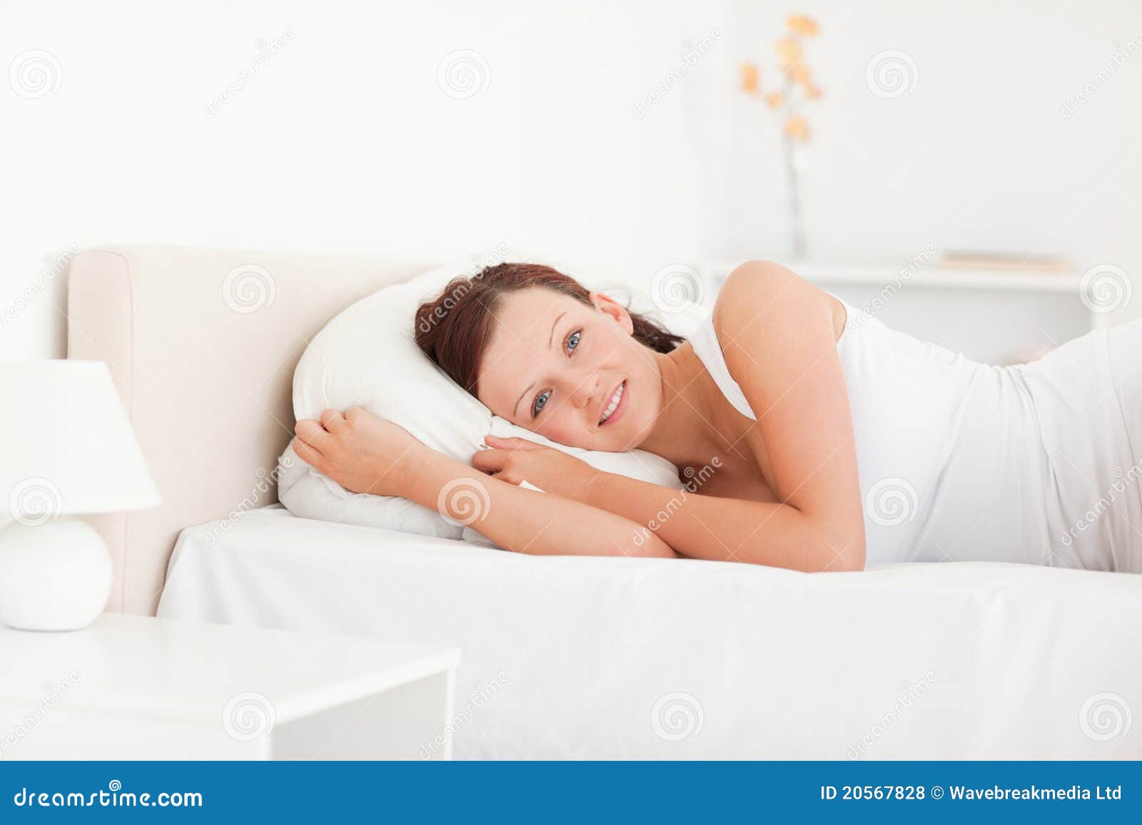 Relaxing Beautiful Woman Lying on a Bed Stock Photo - Image of pretty ...