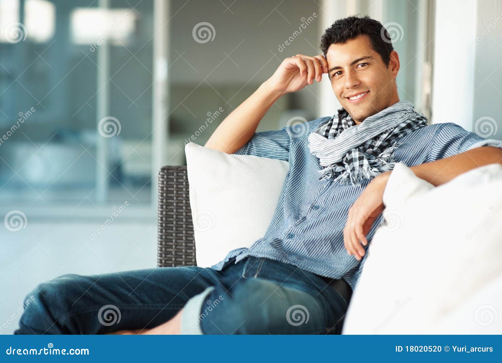 Relaxing on coach stock photo. Image of friendly, home - 18020520