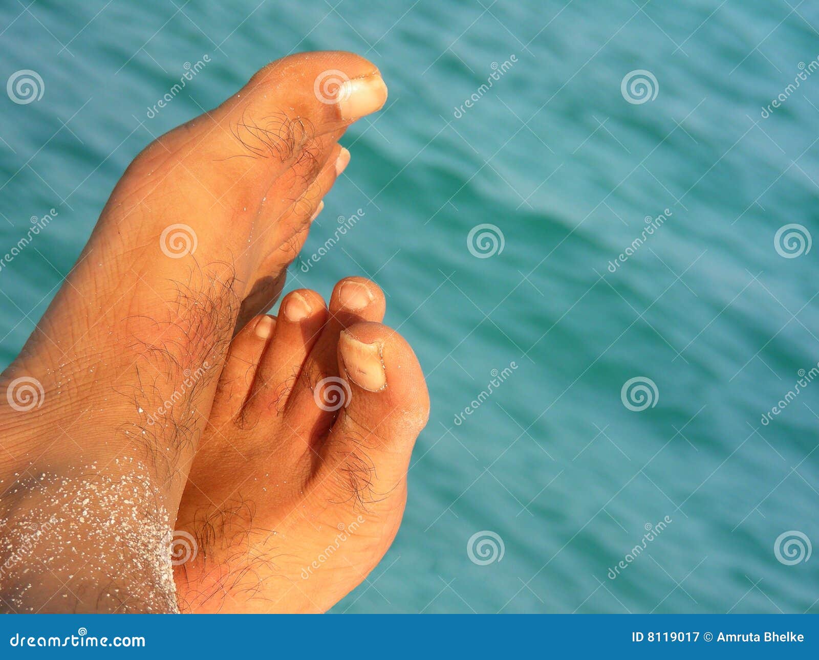 Relaxing Feet stock image. Image of relaxing, sand, cross - 8119017