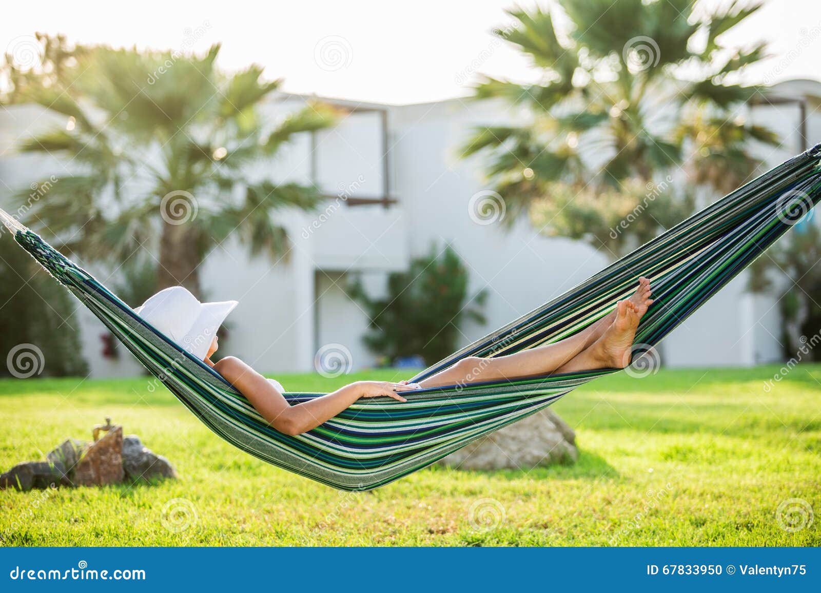Relaxing in the hammock. stock photo. Image of holiday - 67833950