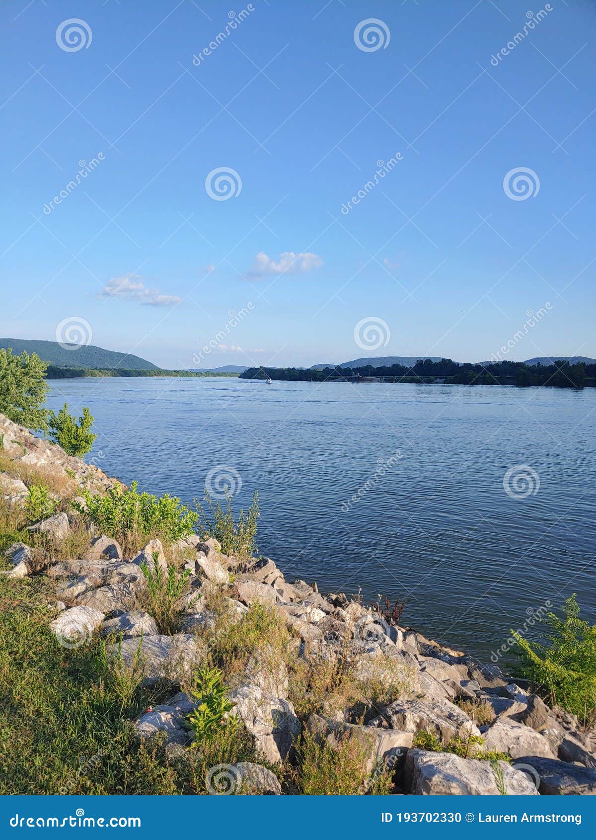 Relaxing at the lake stock photo. Image of lakr, cliff - 193702330