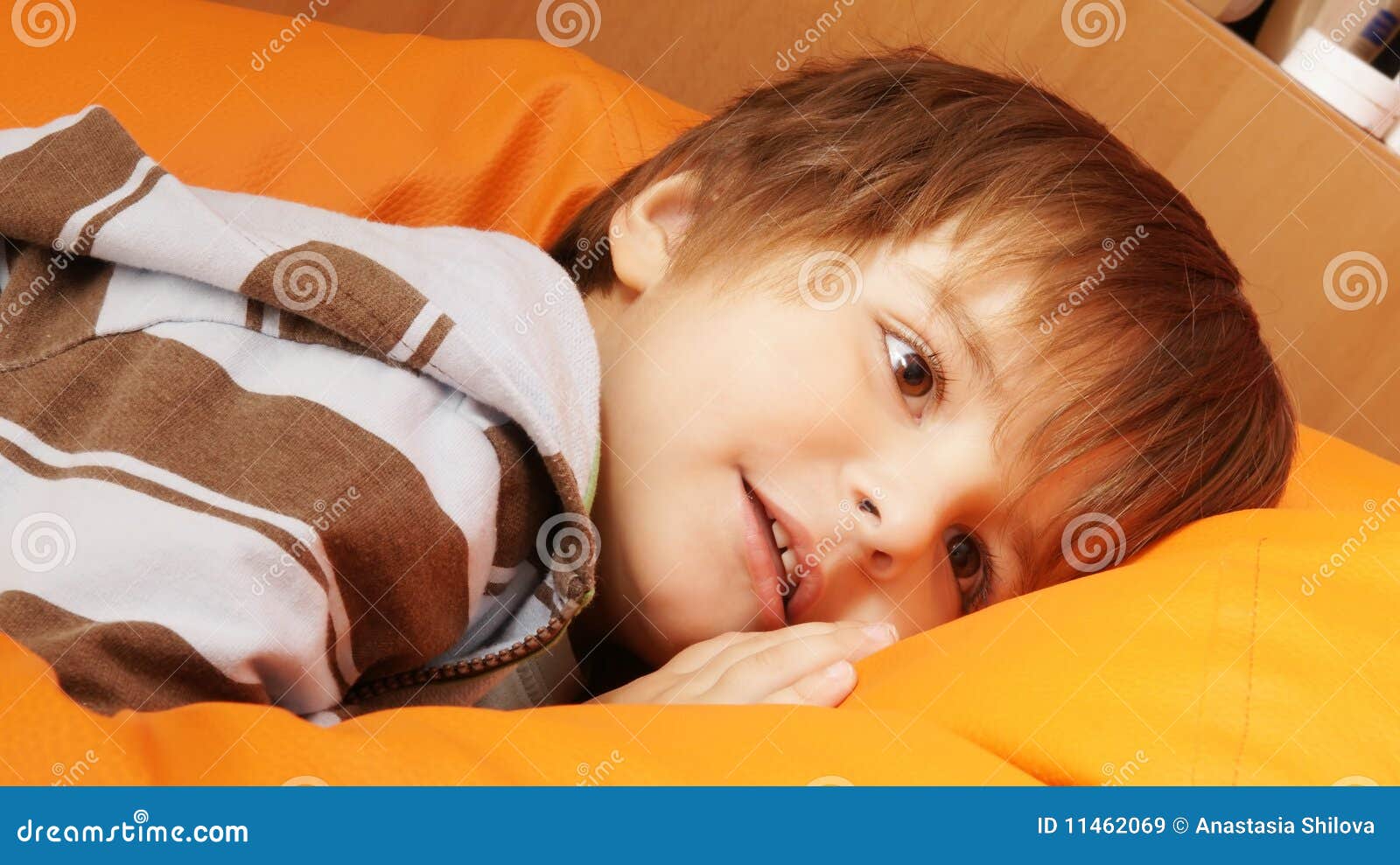 Relaxing little boy stock image. Image of expression - 11462069
