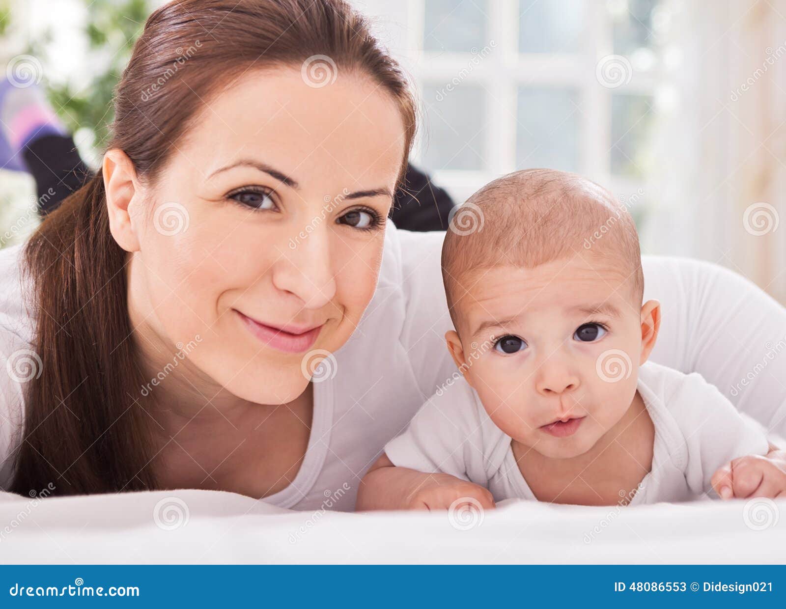 Relaxing Mother with Baby at Home Stock Image - Image of loving, laugh ...
