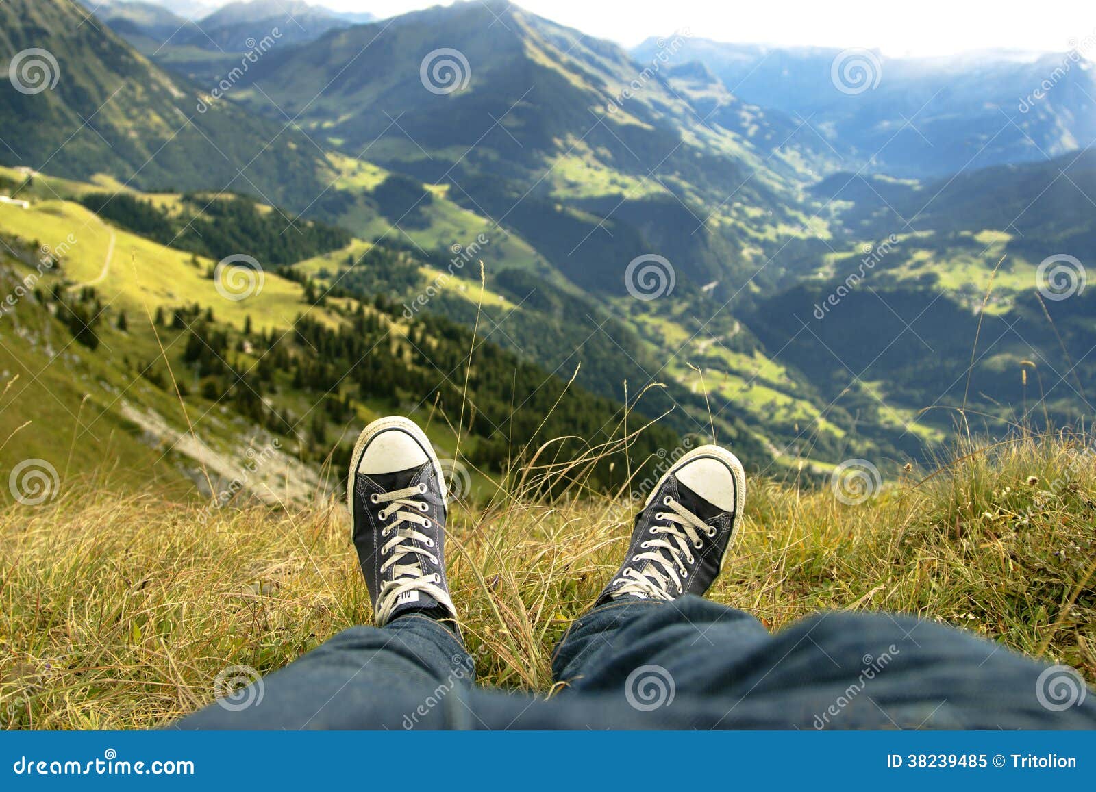 Relaxing on the Mountain in Switzerland in Converse Stock Image - Image ...