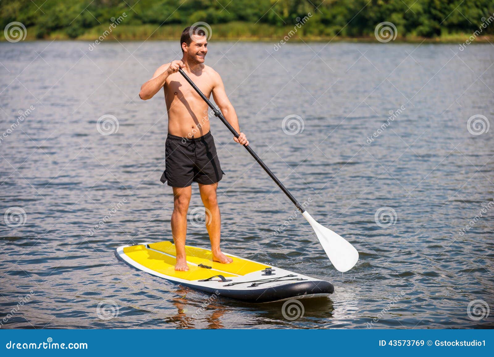 Relaxing on paddleboard. stock image. Image of positivity - 43573769