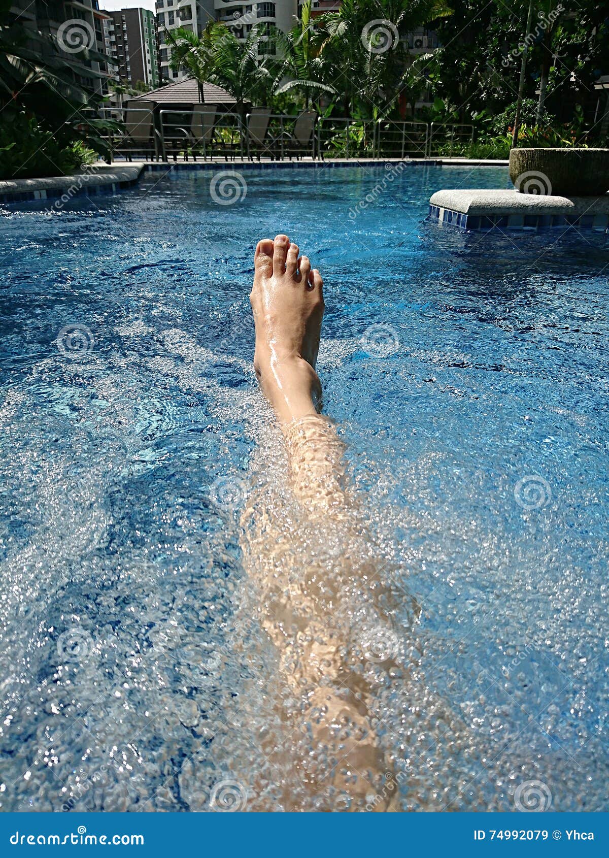 Relaxing by the pool stock image. Image of sticking, waters - 74992079